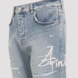 Amiri Repaired Slim Jeans