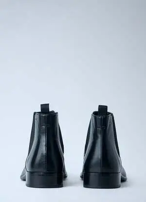 Prada Leather Chelsea Boots - Black