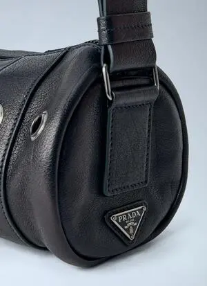 Prada Eyelet Detail Leather Cylinder Bag