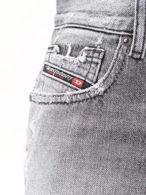 DIESEL® Blue Denim Shorts With A Destroyed Effect