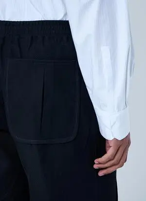 KIKO KOSTADINOV High-waisted Pleated Trousers