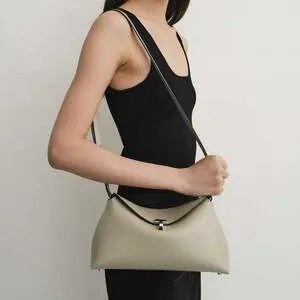 TOTEME T-lock Leather Clutch Bag