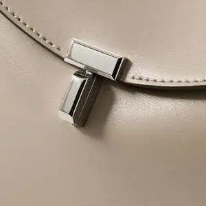 TOTEME T-lock Leather Clutch Bag