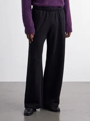LES TIEN Party Wide-leg Garment-dyed Cotton-fleece Sweatpants - Black