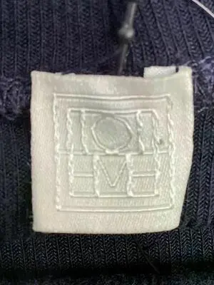 TOTEME Ribbed Turtleneck Sweater