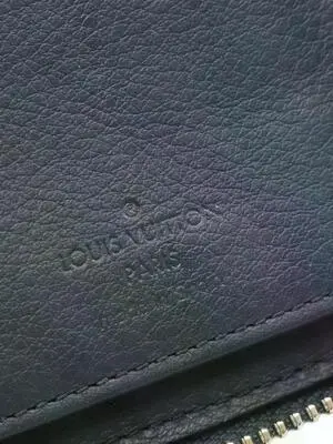 LOUIS VUITTON Vertical Leather Wallet