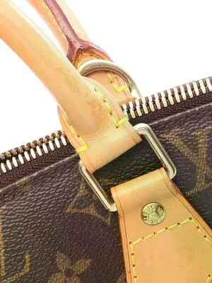 LOUIS VUITTON Monogram Alma Pm Handbag