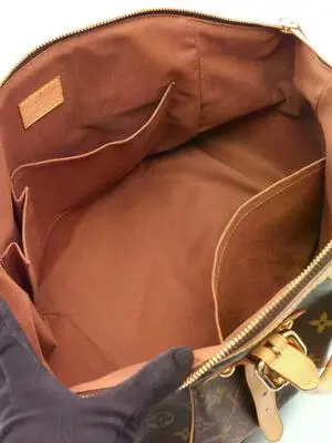 LOUIS VUITTON 2010 Gm Tivoli Monogram Handbag