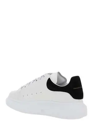 Alexander McQueen Black And Low Top Sneakers With Logo Lettering On The Tongue And Contrasting Heel With Logo Lettering In Leather - White