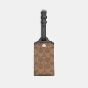 COACH OUTLET Luggage Tag In Signature Canvas - Silver/tan/black