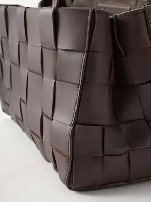 ST. AGNI Woven Leather Shoulder Bag