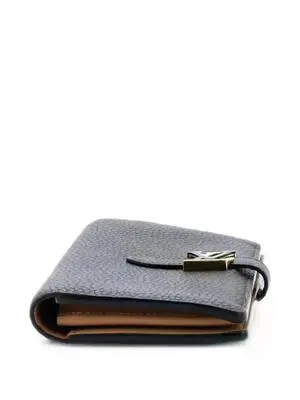 LOUIS VUITTON Capucines Vertical Wallet Leather Small Wallets