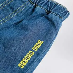 BOBO CHOSES Taxi Saurus Tag Organic Cotton Denim Trousers - Blue