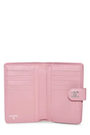 Chanel Embossed Camellia Zip Around Wallet