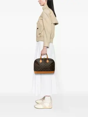 LOUIS VUITTON 1997 Monogram Alma Pm Handbag - Brown