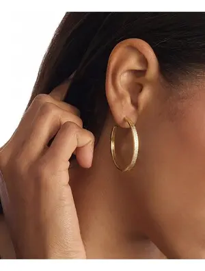 Calvin Klein Textured Linear Hoop Earrings