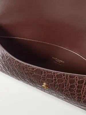 Saint Laurent Logo Detailed Croc-effect Leather Clutch - Brown