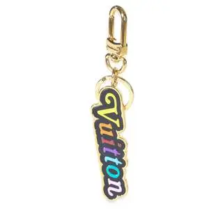 LOUIS VUITTON Gold Metal New Wave Bag Charm & Key Holder - Multicolor