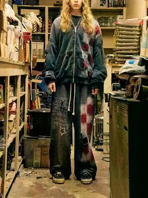 SATOSHI NAKAMOTO Get What I Want Distressed Graffiti-print Trousers