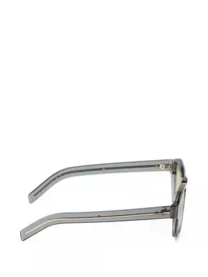 Prada Sunglasses With The Iconic Metal Plaque