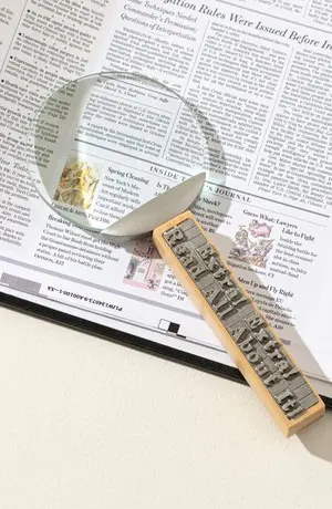 UNCOMMON GOODS Hot Off The Press Magnifying Glass