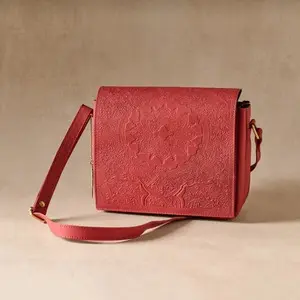 TEN THOUSAND VILLAGES Kohra Embossed Leather Crossbody Bag