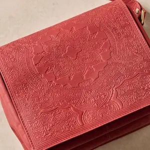 TEN THOUSAND VILLAGES Kohra Embossed Leather Crossbody Bag