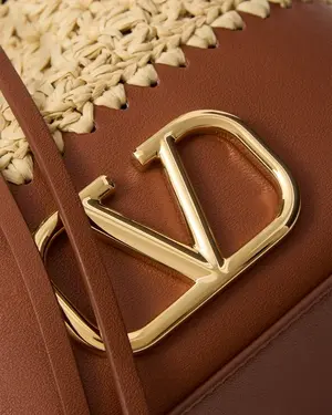 Valentino Garavani Vlogo Mini Bucket Bag
