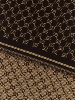 Gucci All-over Gg Motif Wool Scarf With Fringed Edges - Brown