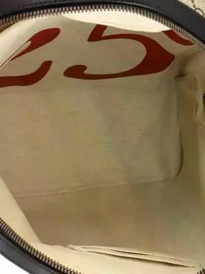 Gucci Zip Around Gg Coated Canvas Medium Backpack