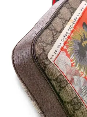 Gucci Gg Coated Canvas Messenger Bag With Applique