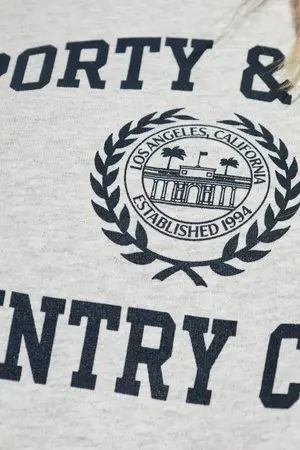 SPORTY  RICH Sporty Rich Varsity Crest Crewneck Sweatshirt