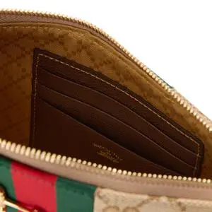 Gucci Monogrammed Printed Clutch With Horsebit Detail