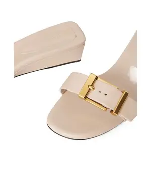 Khaite Buckled Leather Wedge Sandals