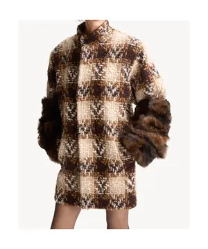 Saint Laurent Muffs In Shearling