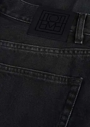 TOTEME Faded Effect Tapered-leg Jeans