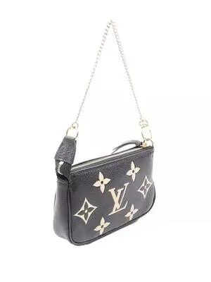 LOUIS VUITTON 2021-2026 Bicolor Monogram Empreinte Mini Pochette Accessoires Handbag