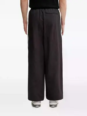 PUMA T7 Logo-print Side-stripe Track Pants
