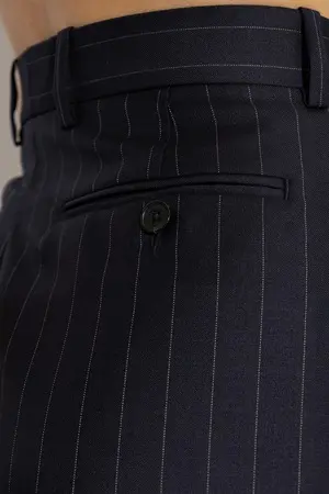 Givenchy Wool Pleated Pinstriped Trousers