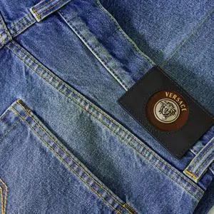 Versace Washed Distressed Denim Jeans