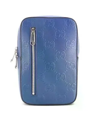 Gucci Gg Embossed Perforated Leather Sling Backpack - Blue