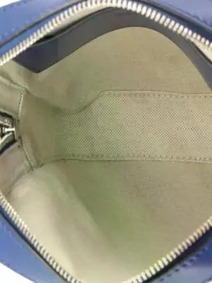 Gucci Gg Embossed Perforated Leather Sling Backpack