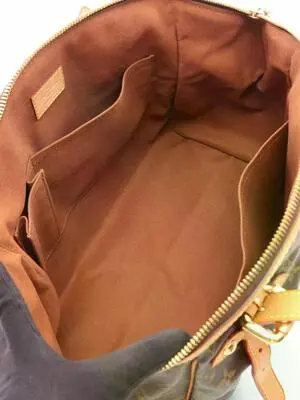 LOUIS VUITTON 2010 Gm Tivoli Handbag