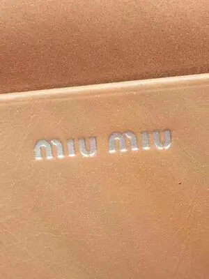 Miu Miu Logo-embossed Leather Clutch Bag