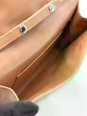 Miu Miu Logo-embossed Leather Clutch Bag