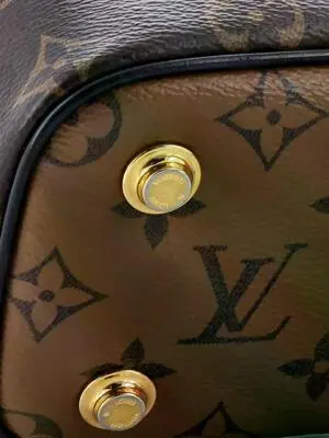 LOUIS VUITTON Reverse Monogram Canvas Pm Satchel