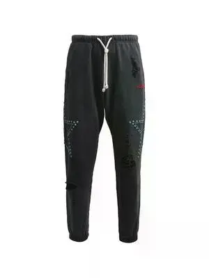 SATOSHI NAKAMOTO Distressed Star-studded Track Pants