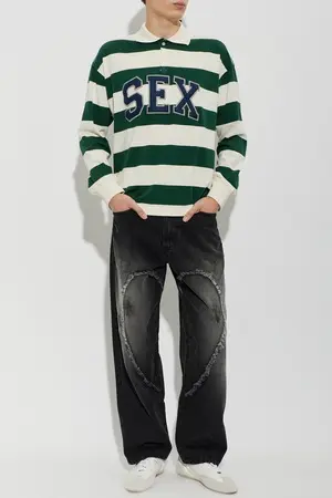 CARNE BOLLENTE Vintage Effect Jeans With Distressed Heart Detail