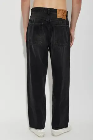 CARNE BOLLENTE Vintage Effect Jeans With Distressed Heart Detail