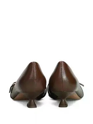THE SELLER Pointed-toe Buckled Pumps
